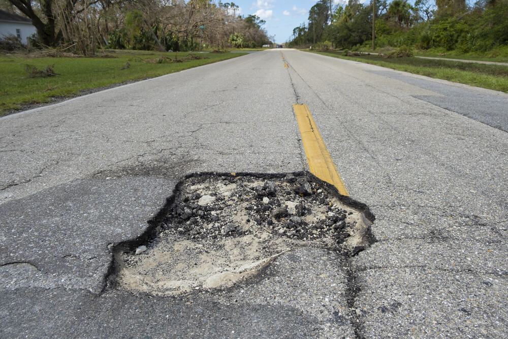 Navigating Pothole Perils: Your Guide to Post-Impact Vehicle Care ...